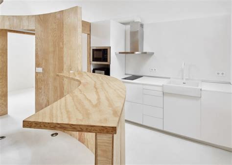 Pine Walls Feature In Vaulted Basement Home By Raúl Sánchez