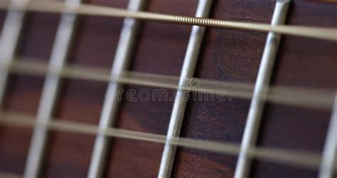 Vibration Of Strings On A Brown Fretboard Of A Wooden Guitar Stock Video Video Of Classic