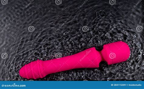The Pink Creates A Vibration On The Surface Of The Water Sex Toy On A