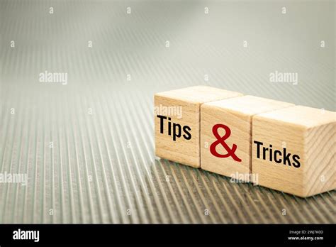Tips And Tricks Symbol Business Words Written On Wooden Blocks Tips