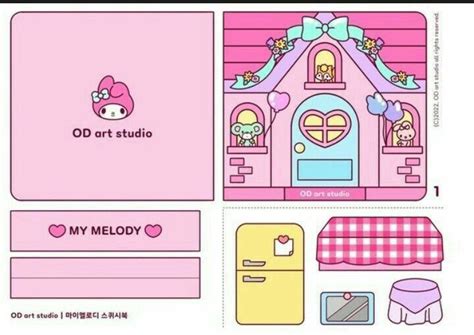 The Paper Doll House Is Pink And Has Hello Kitty On It