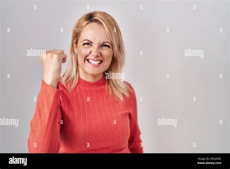 Blonde Woman Standing Over Isolated Background Angry And Mad Raising