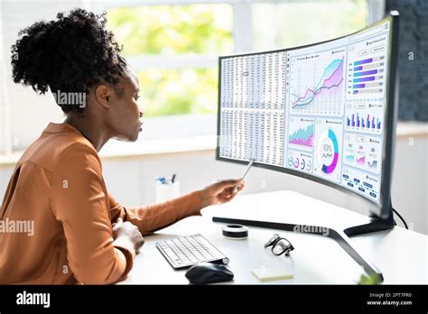 Analyst Woman Looking At Business Data Analytics Dashboard Stock Photo Alamy