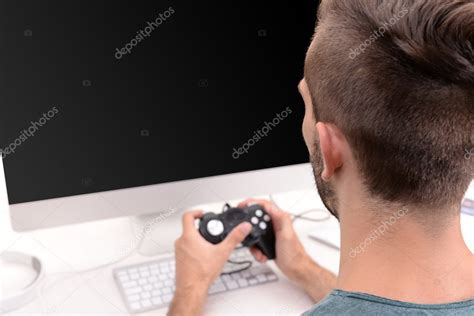 Man Playing Computer Games Stock Photo Belchonock