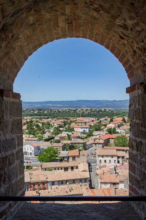 Historical Buildings Framed By A Stone Window Of The Fortified City
