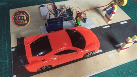 rfid based automatic vehicle barrier control ma robotic