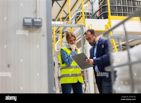 Supervisor Manager Scolding Employee In Modern Industry Factory