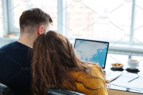 Couple Using Laptop Computer At Home Cheap Airfare Babe Success Airfare