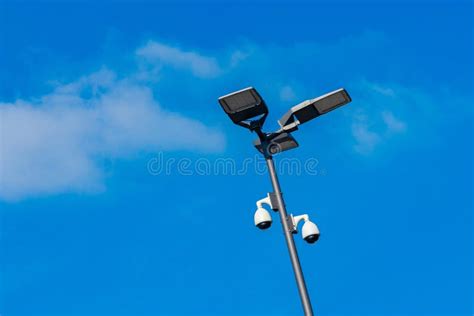 Surveillance Cameras On A Pole Against The Sky Stock Image Image Of