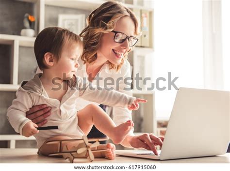 Mother Suits Son Over Royalty Free Licensable Stock Photos Shutterstock