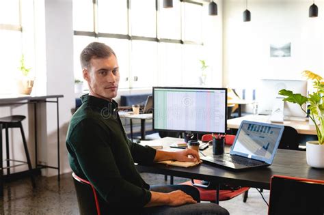 Businessman Using Laptop And Analyzing Data At Modern Office Desk Copy Space Stock Image