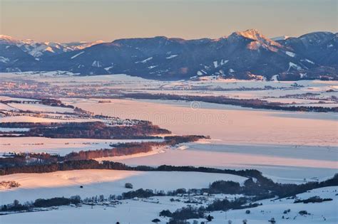 Liptov Countryside And Frozen Liptovska Mara Dam From Janosikov Stol Rock During Winter Stock