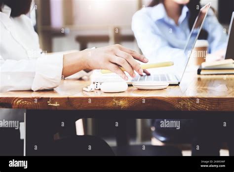 Female Charging Smartphone Using Wireless Fast Charging Pad At Work Stock Photo Alamy