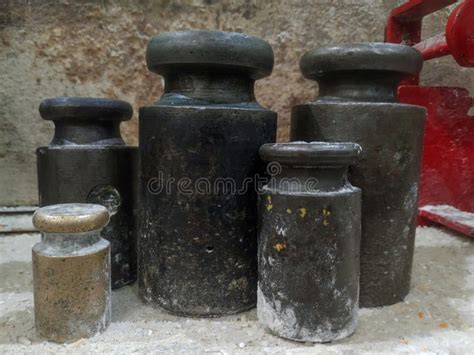 Weights Or Pendulum Scales Made Of Iron With Various Weight Sizes Stock