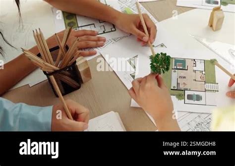 Architect And Engineer Use Tree Model Discuss About Building Blueprint