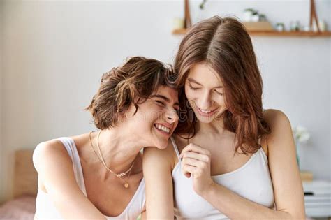 Two Women In Cozy Attire Sitting Stock Image Image Of Communication