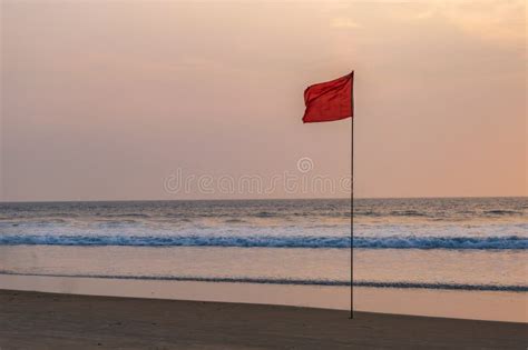 Red Flag On Beach On Sea Or Ocean As A Symbol Of Danger The Sea State Is Considered Dangerous