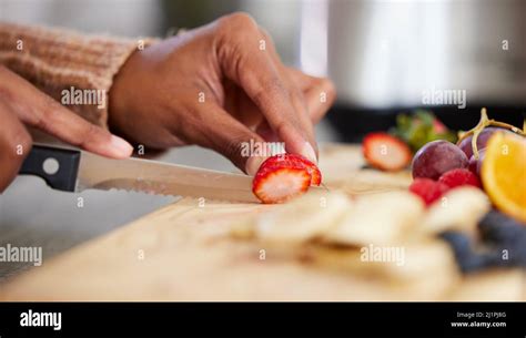 Eating Fresh Fruit Is An Instantly Cooling Snack Closeup Shot Of An Unrecognisable Woman