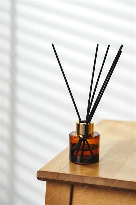Premium Photo Elegant Reed Diffusers On Wooden Surface With Soft
