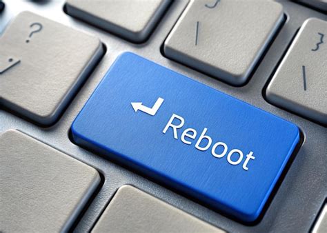 Keyboard Reboot Button Representing The Concept Of Restarting Refreshing And Rebooting Systems