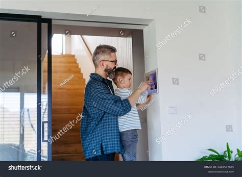 Father Showing Son Smart Home System Stock Photo 2449577835 Shutterstock