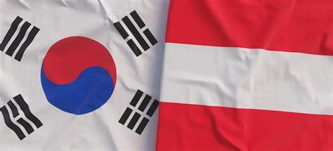 한국과 오스트리아의 국기 리넨 플래그 근접 촬영 캔버스로 만든 국기 한국 서울 오스트리아 국가 상징 3d 그림 프리미엄 사진