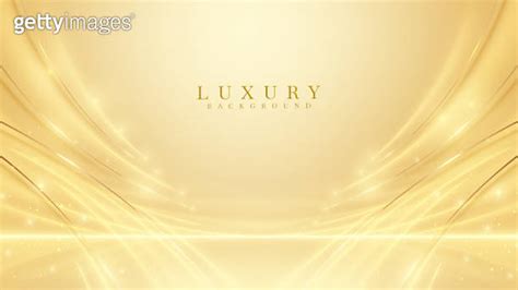 Elegant abstract background of golden swirls line with shimmering particles and bokeh ...