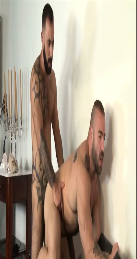 Two Muscular Tattooed Guys Fuck