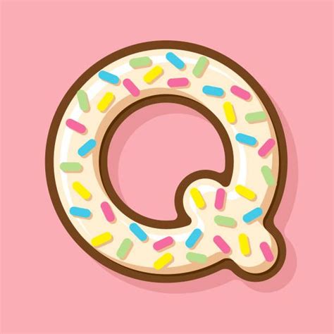 A Donut With Sprinkles Is Shown In The Shape Of The Letter Q