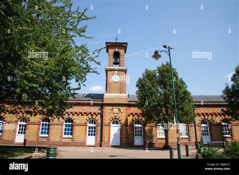A View Of The Clock Tower Standing Tall Beside The Rsa Island Centre In