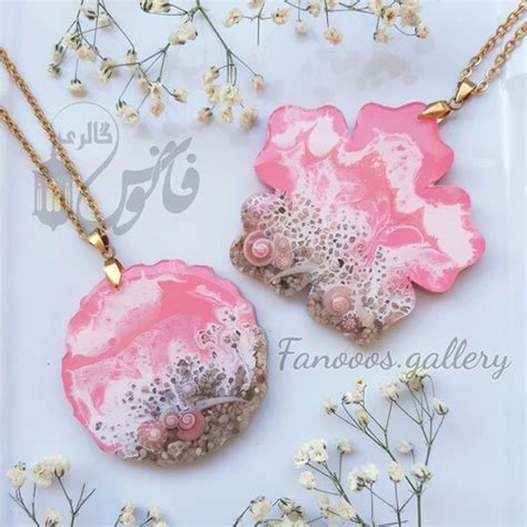 خرید و قیمت گردنبند های دریای صورتی رزینی بازنجیر طرح دفرمه و گل ترب