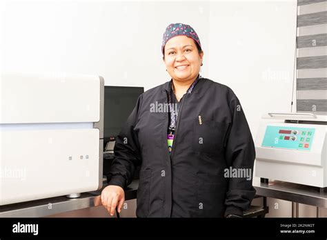 Female Scientist Working At The Laboratory With A Thermal Cycler Polymerase Chain Reaction
