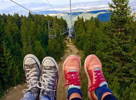 Premium Photo Low Section Of People Against Overhead Cable Car
