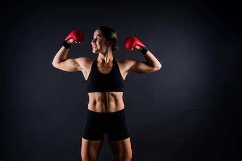Premium Photo Young Woman Athletic Female Mma Fighter Training