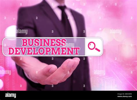 conceptual hand writing showing business development concept meaning
