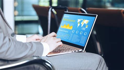 Business Wireless Working On Laptop Computer Analyst Business Data Report Screen Showing