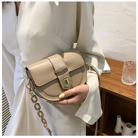 2024 New Fashion Simple Chain Pu Saddle Bag Womens Shoulder Crossbody