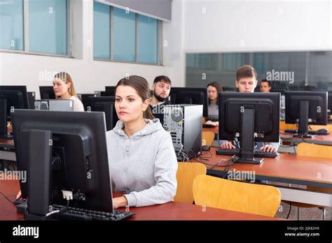 Computer Lessons For Adults In Classroom Stock Photo Alamy
