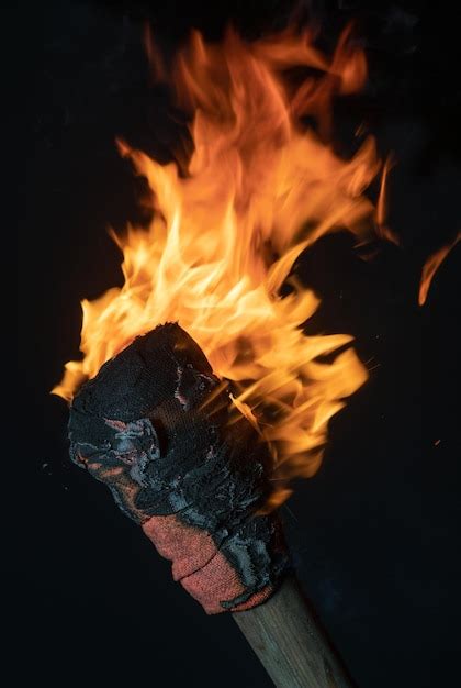 Premium Photo Torch Fire Texture On Black Background