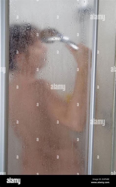 Woman With Shower Head Stock Photo Alamy