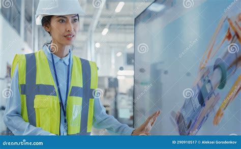 Factory Office Meeting Chief Engineer Explaining New Workflow For