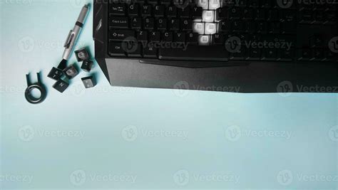 keyboard keys brushes and key for replacing keys on a blue background