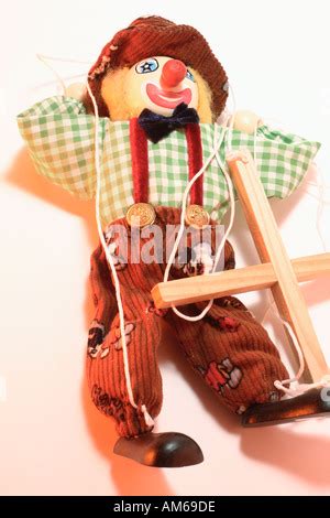 Puppet On A String Colorful Clown Dressed With Clothes In The Stock Photo 61626884 Alamy