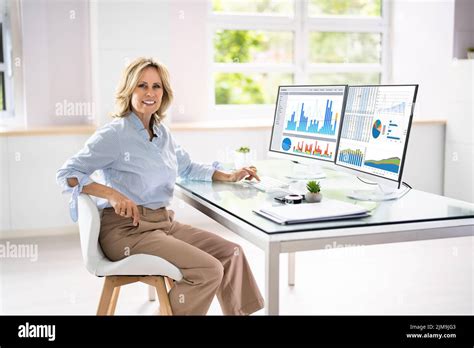 Analyst Woman Looking At Business Data Analytics Dashboard Stock Photo Alamy