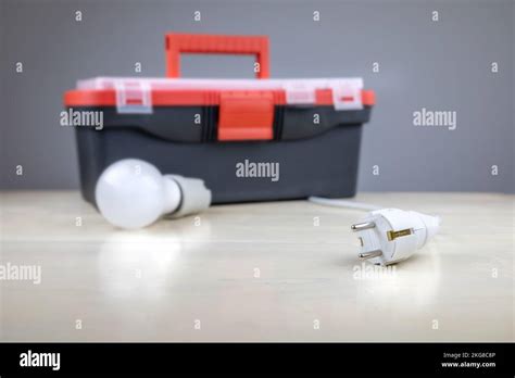Installing A Light Bulb Stock Photo Alamy