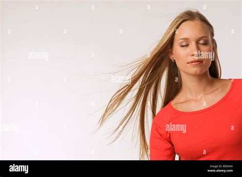 Young woman eyes closed, portrait Stock Photo - Alamy