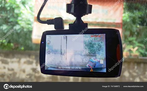 malfunctioning car cctv monitor displaying distorted lines indicating