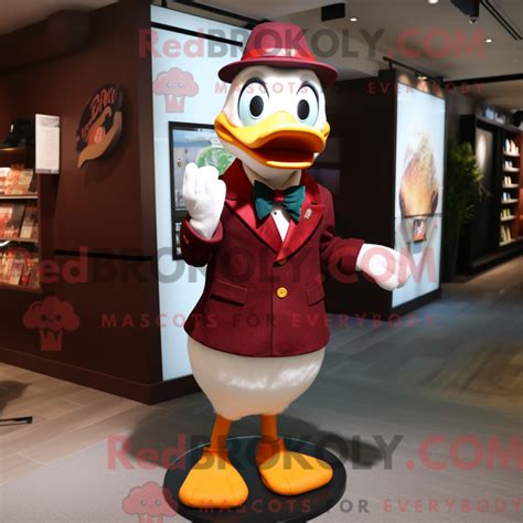 Maroon Duck Mascot Costume Character Dressed With A Blazer And