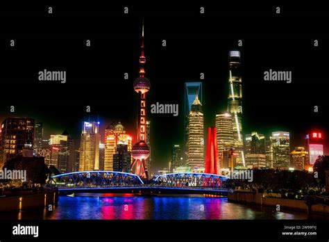 A Stunning Night Time View Of A Modern Chinese City Skyline