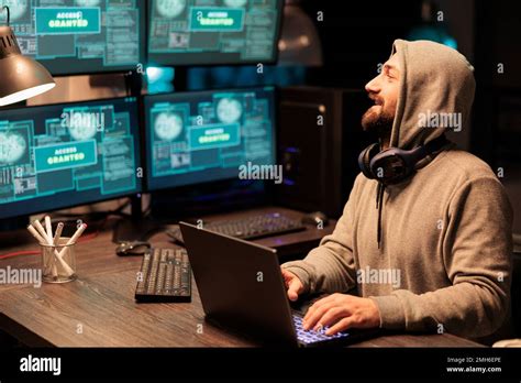 it male hacker using computer to break system firewall hacking